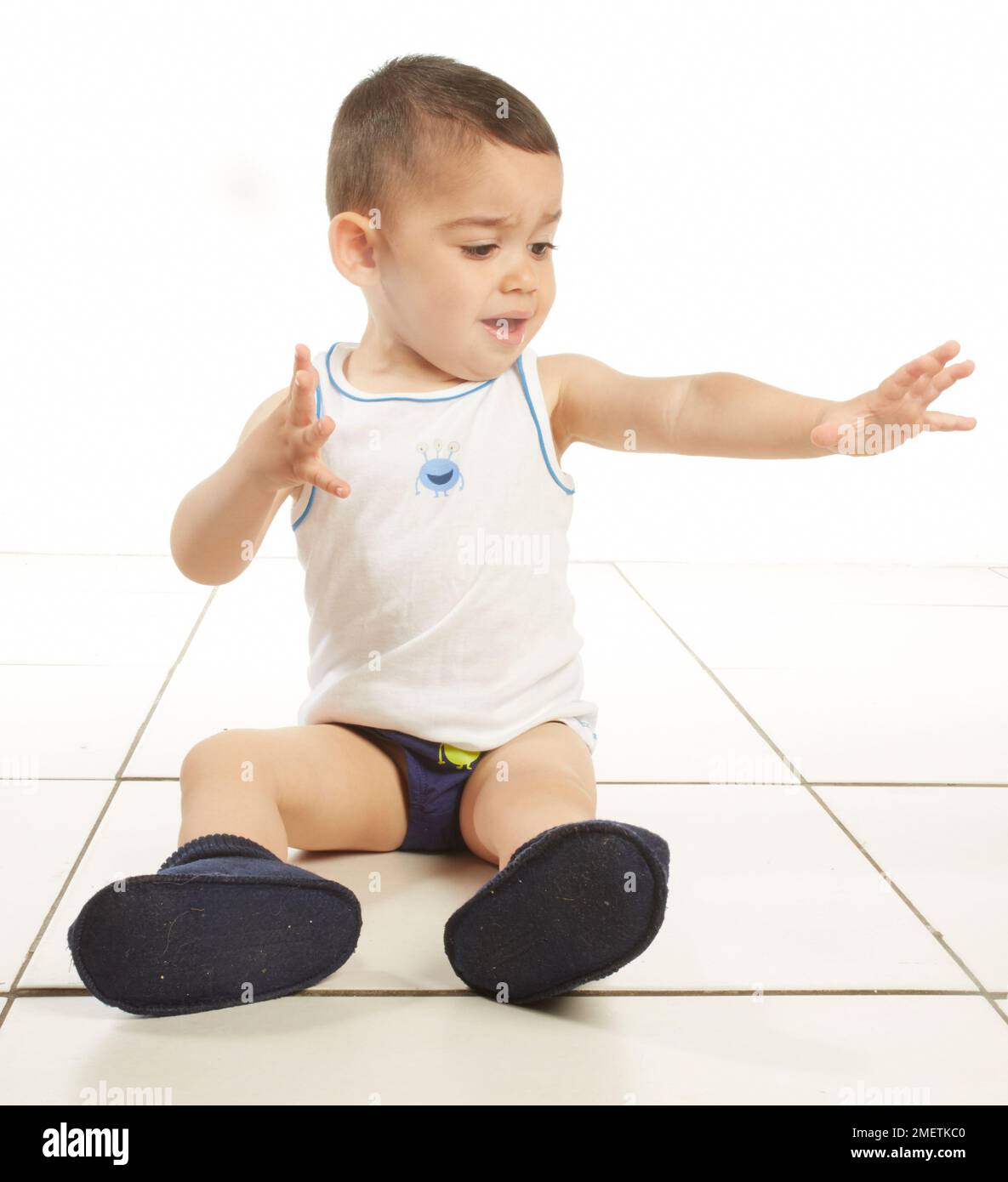 Boy looking down his pants hi-res stock photography and images - Alamy