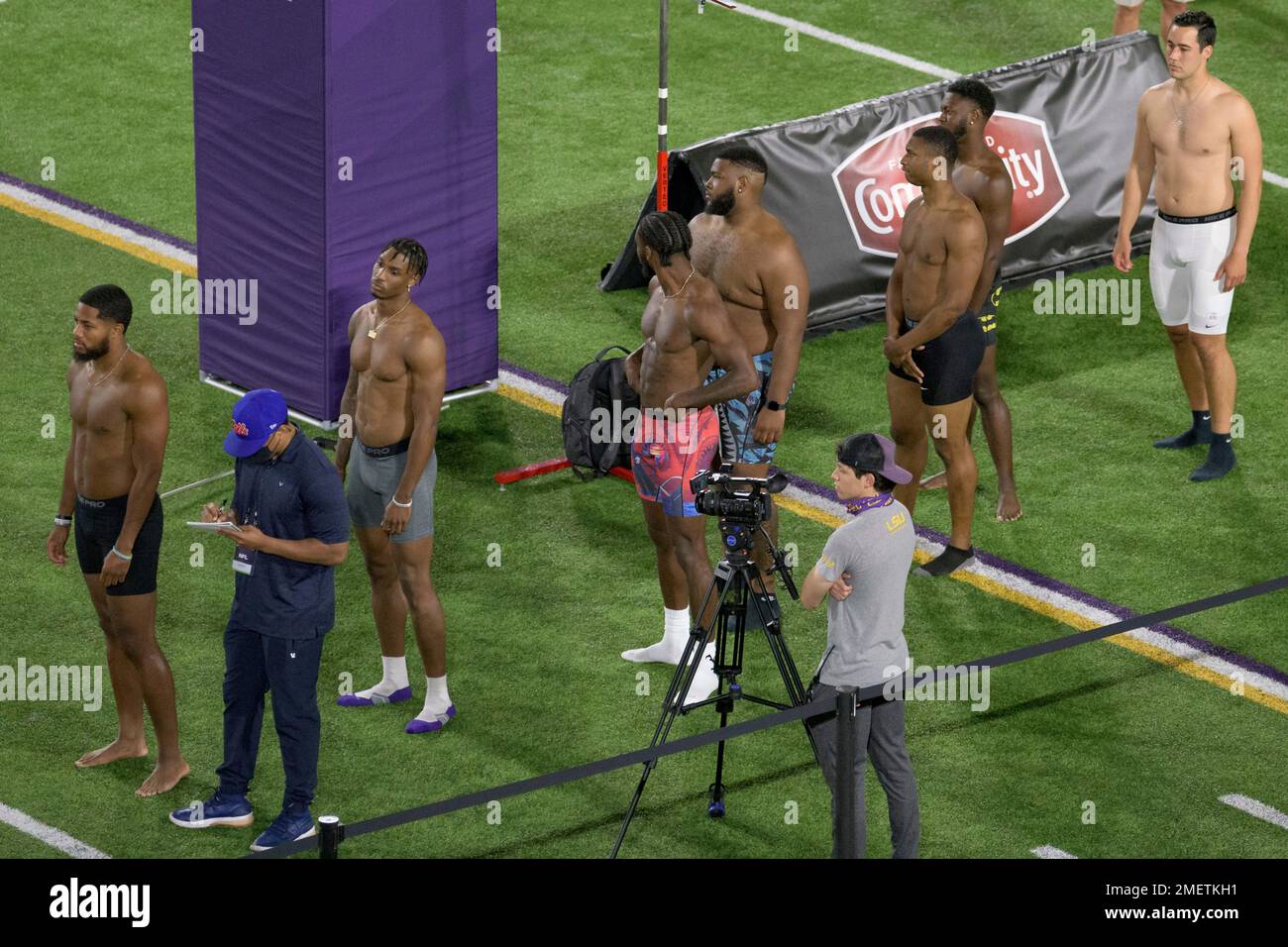 LSU players line up to be weighed during an NFL Pro Day at LSU in Baton ...