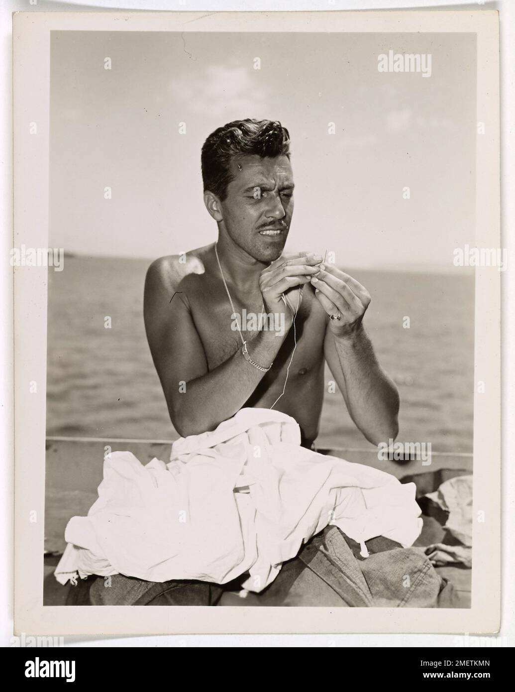Actor Cesar Romero is pictured aboard a Coast Guard-manned transport ...