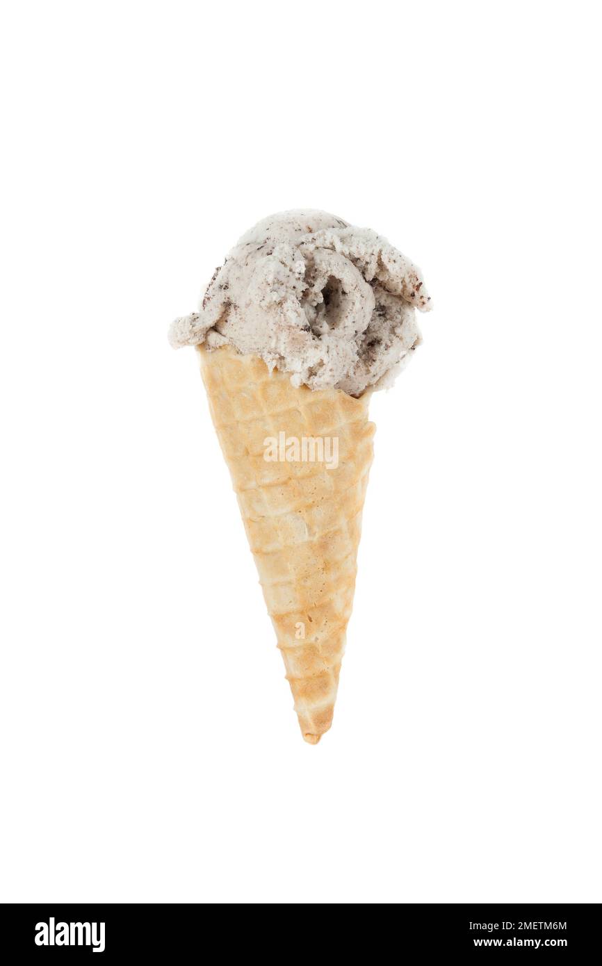 Cornet served with a scoops of ice cream; photo on white background ...