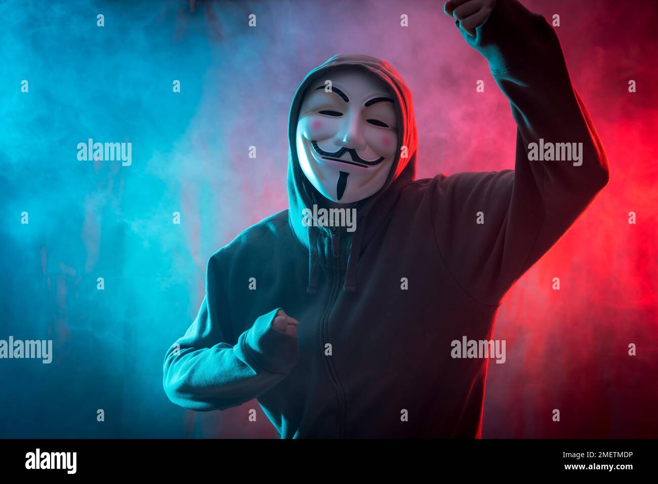 Hacker with anonymous mask with a symbol of fight, with a background of ...