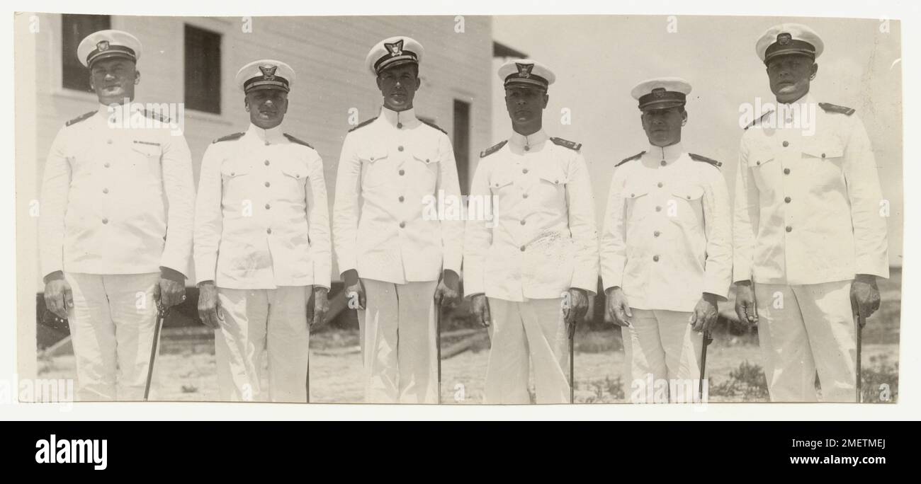 A group photograph of U.S. Coast Guardsmen, captured during their ...
