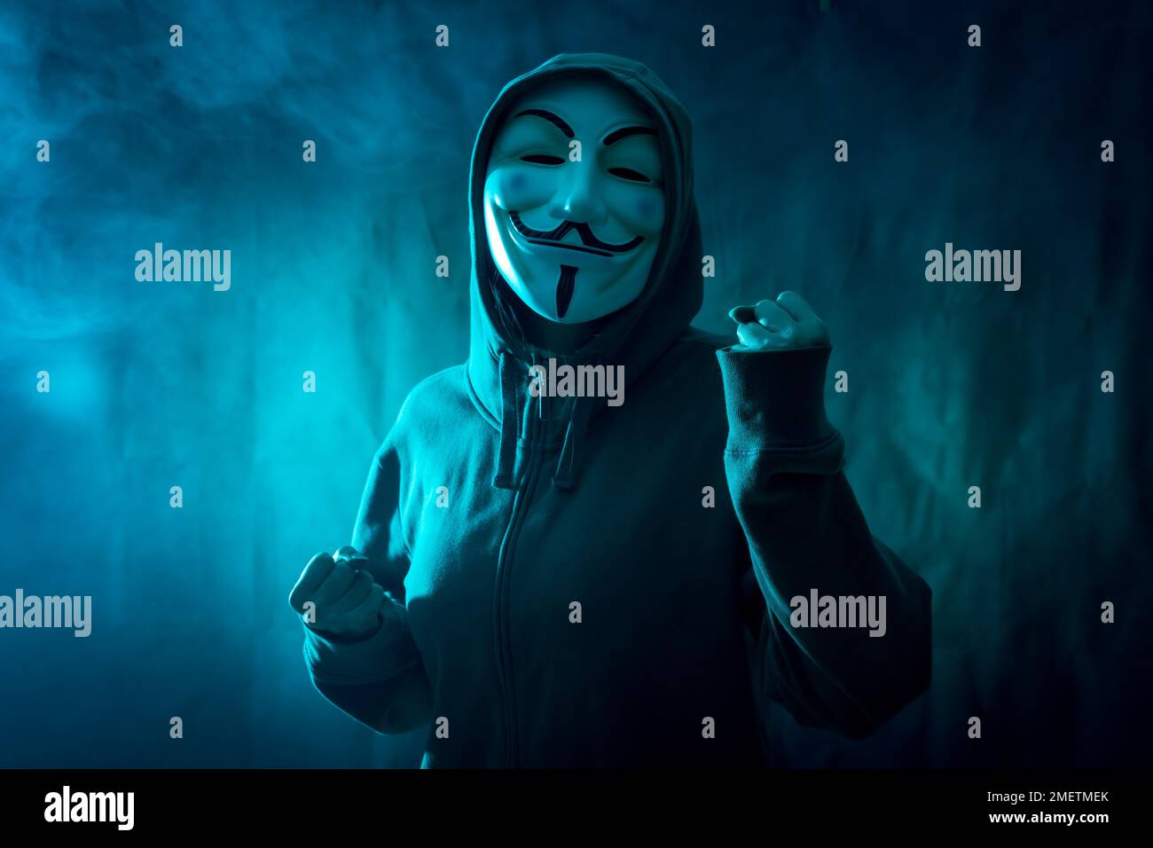 Hacker with anonymous mask with a symbol of fight, with a background of ...