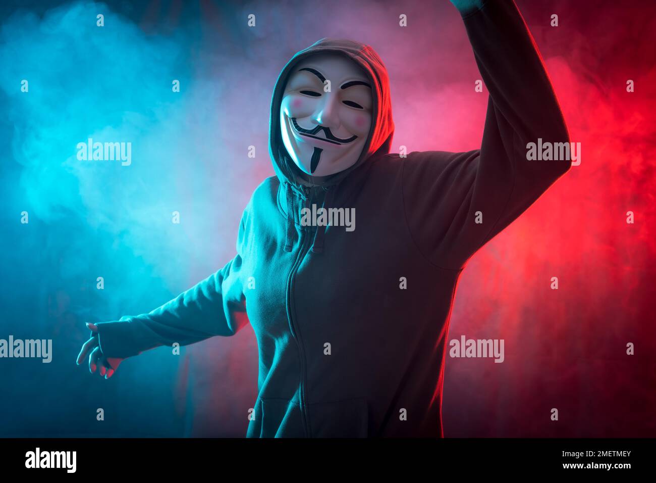Hacker with anonymous mask with a symbol of fight, with a background of ...