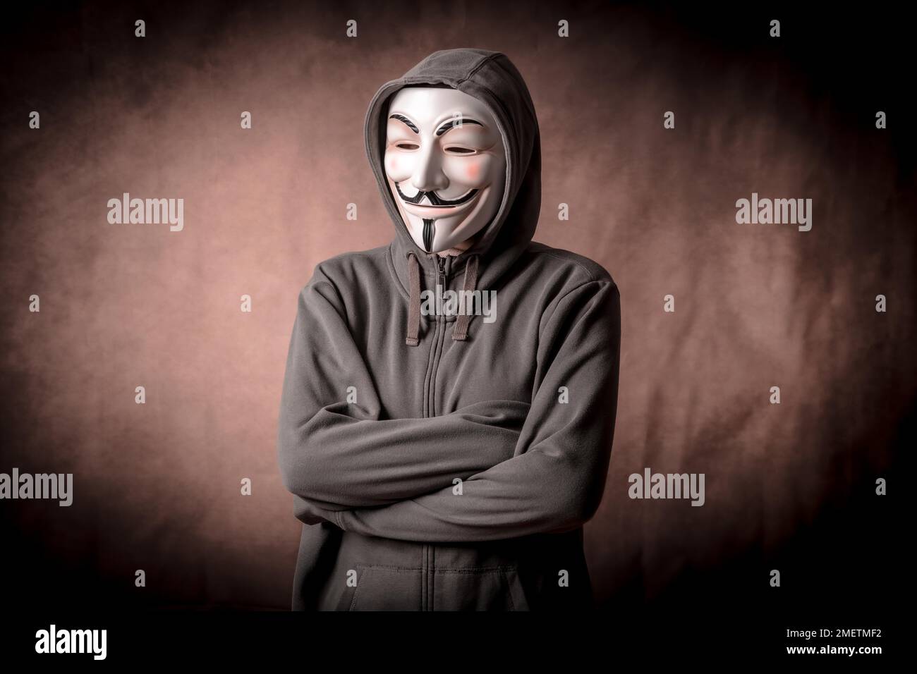 Man wearing anonymous mask hi-res stock photography and images - Alamy