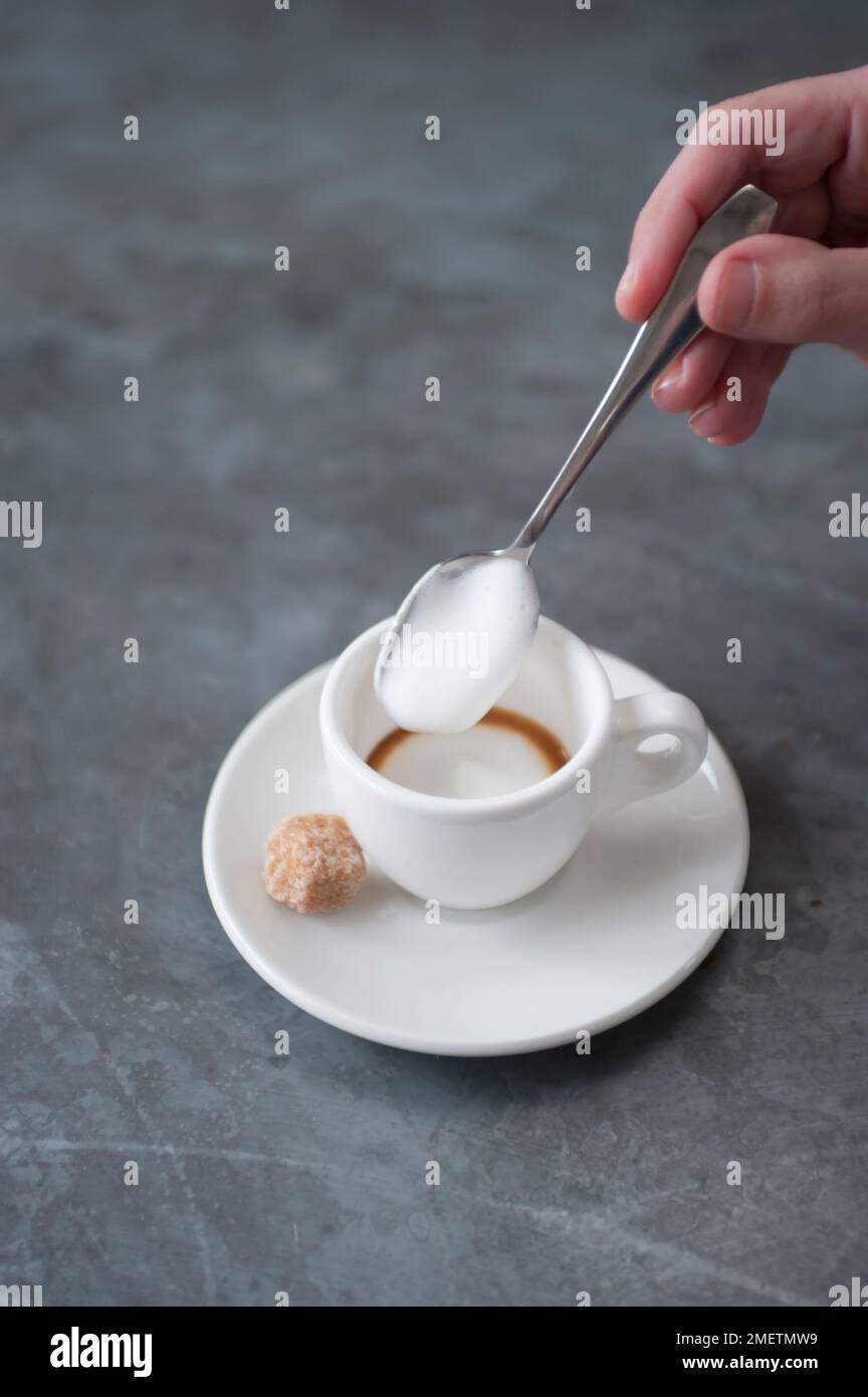 Spooning hi-res stock photography and images - Alamy