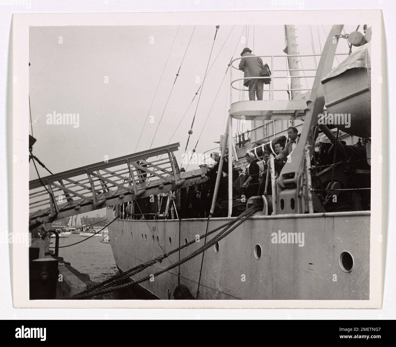 Survivors of the ditched flying boat 'Bermuda Sky Queen' are brought to ...