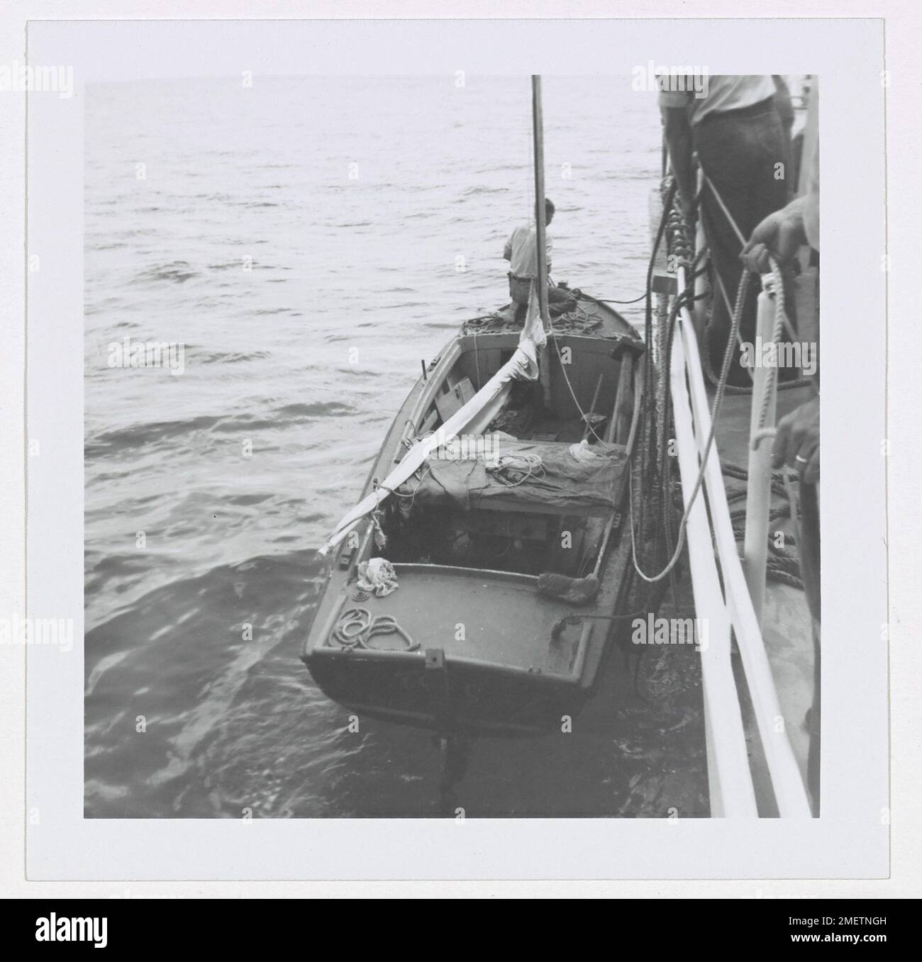 A small sailboat captured in a photograph, demonstrating the simplicity ...