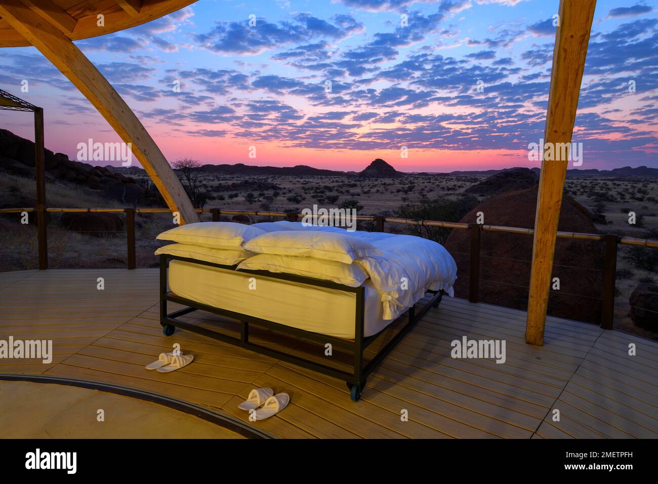Open-air bed in a chalet at Onduli Ridge Lodge, near Twyfelfontein ...