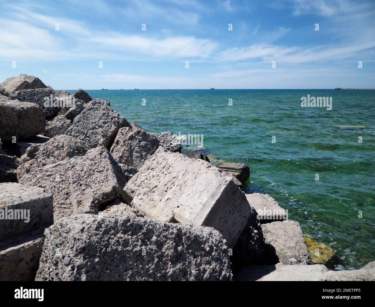 Concrete block dam. Water intake channel for the desalination of sea ...