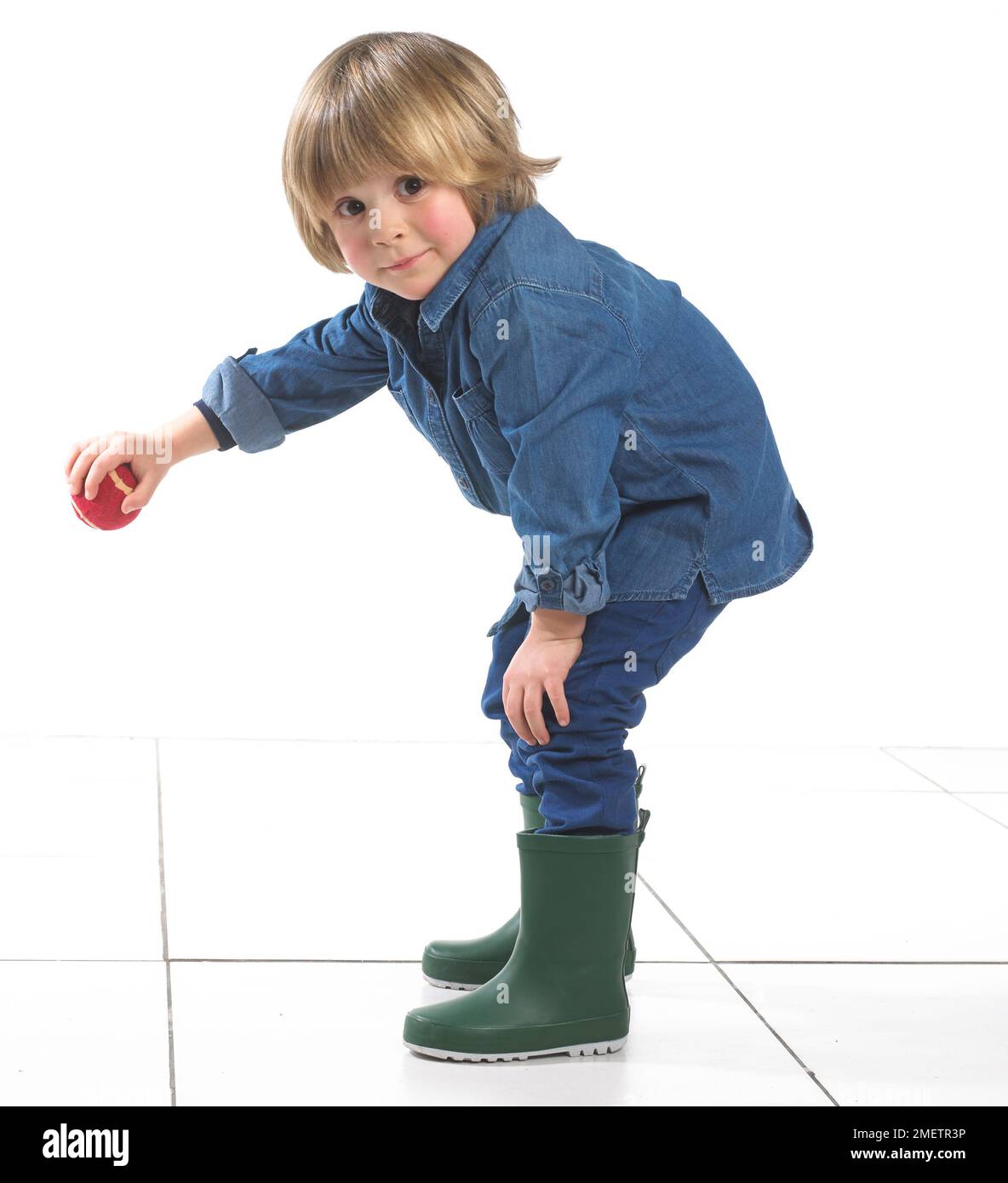 Child bending over boy hi-res stock photography and images - Alamy