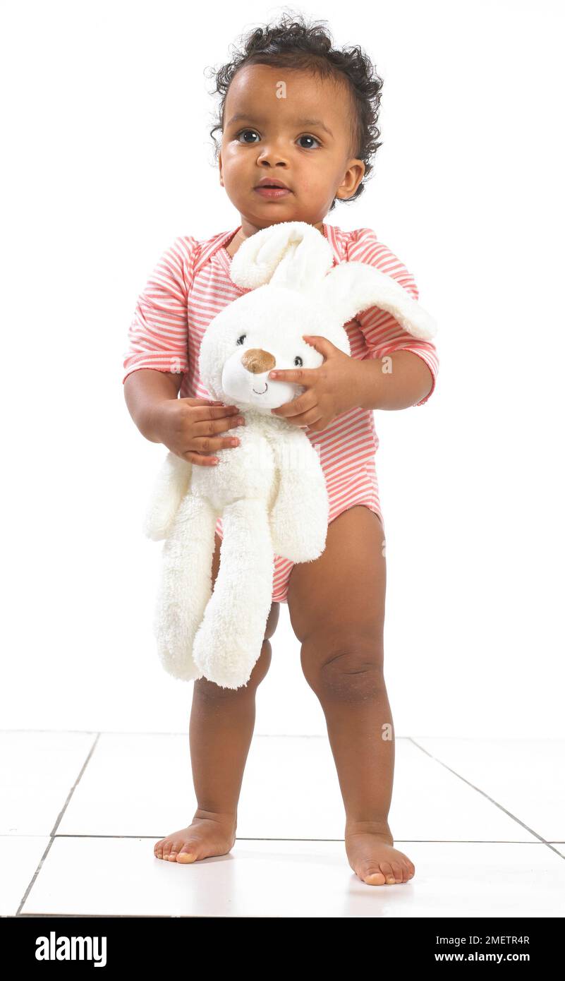 Indian baby boy holding toy hi-res stock photography and images - Alamy