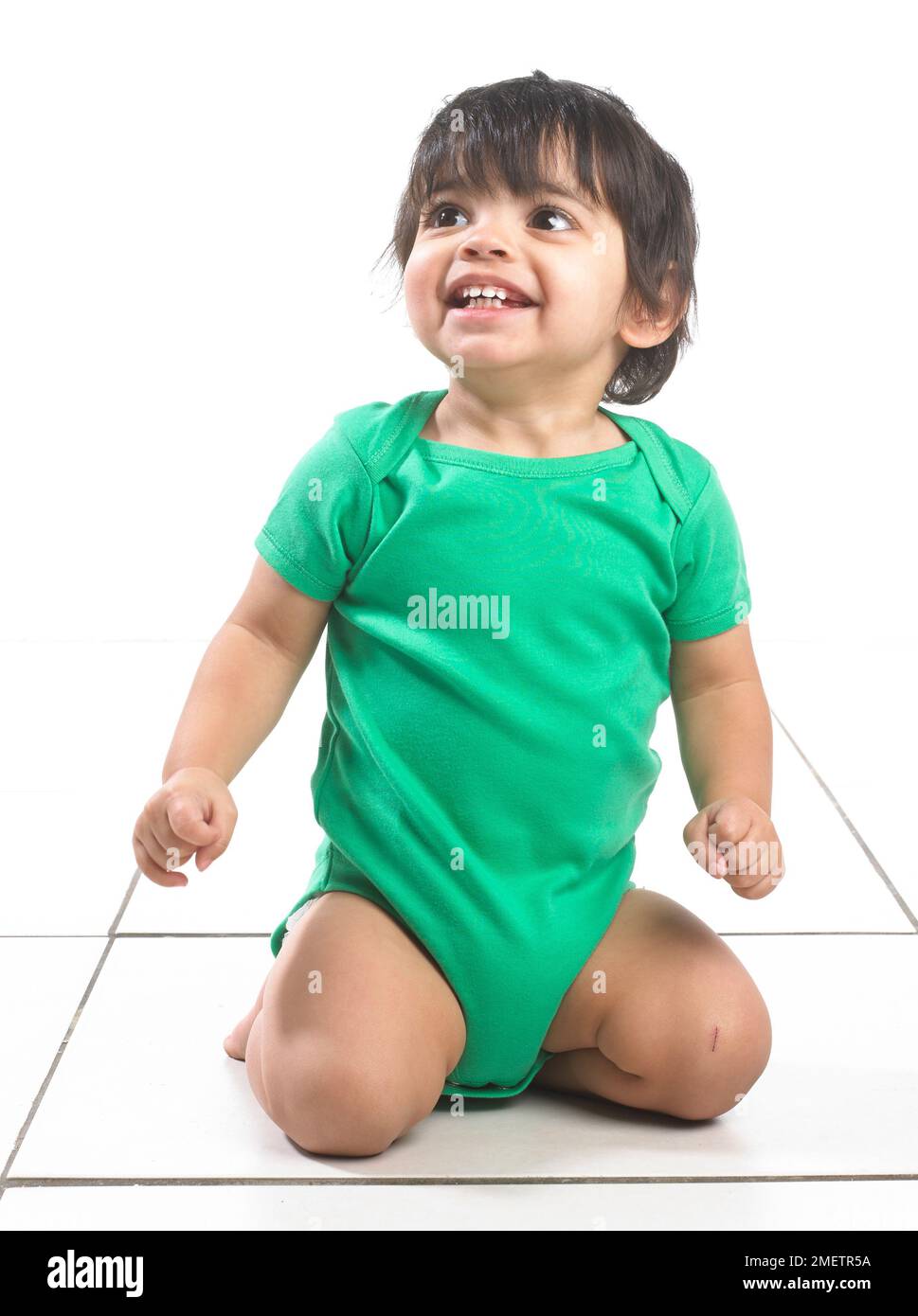 Kneeling on the floor hi-res stock photography and images - Alamy