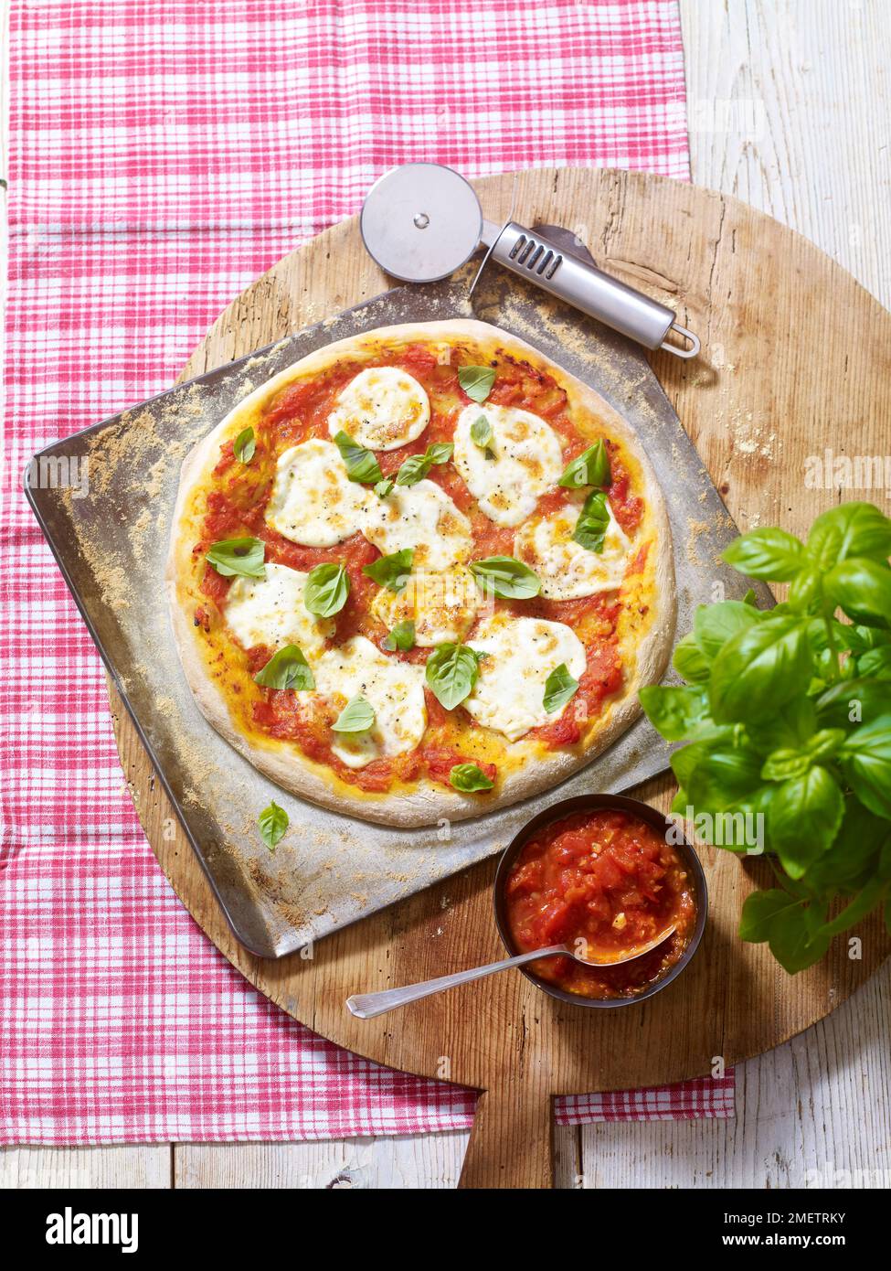 Tomato, basil and mozzarella cheese pizza, cooked Stock Photo - Alamy