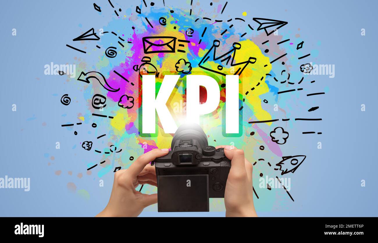 Close-up of a hand holding digital camera with abstract drawing Stock ...