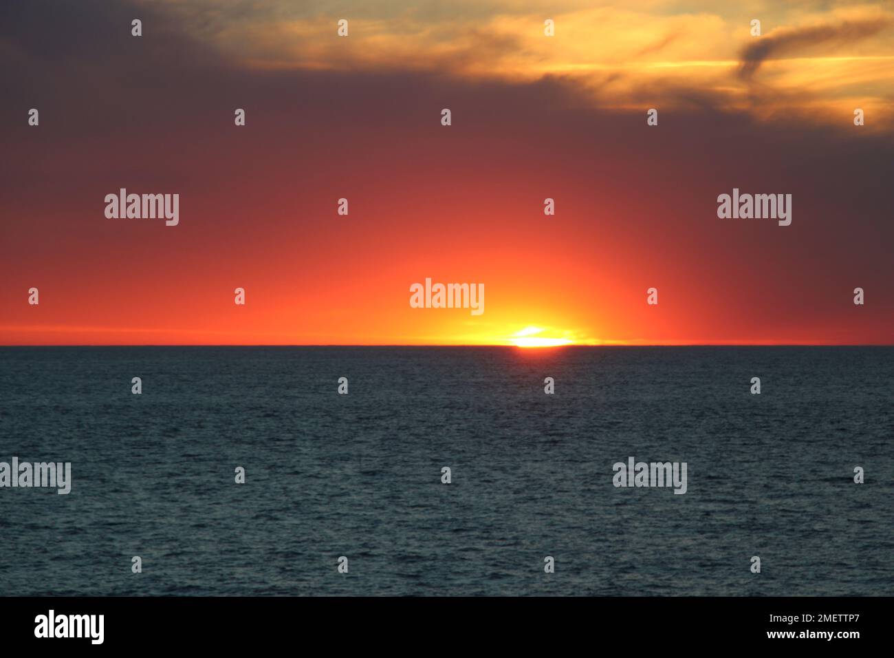 Sunset on the Atlantic Ocean Stock Photo - Alamy