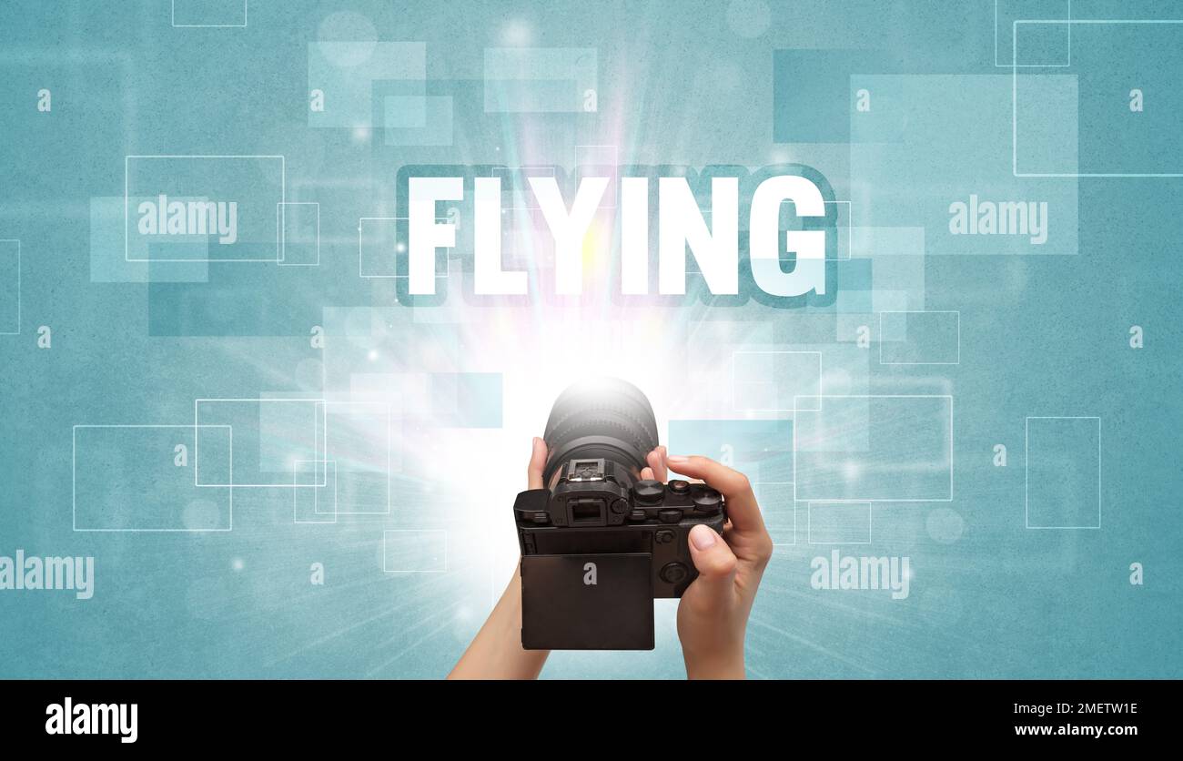 hand holding digital camera, traveling concept Stock Photo - Alamy