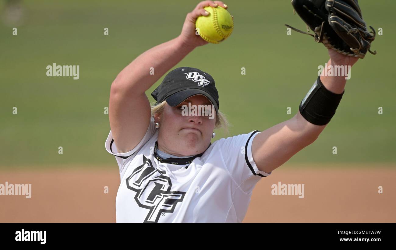 Central Florida pitcher Alea White throws to home plate during an NCAA ...