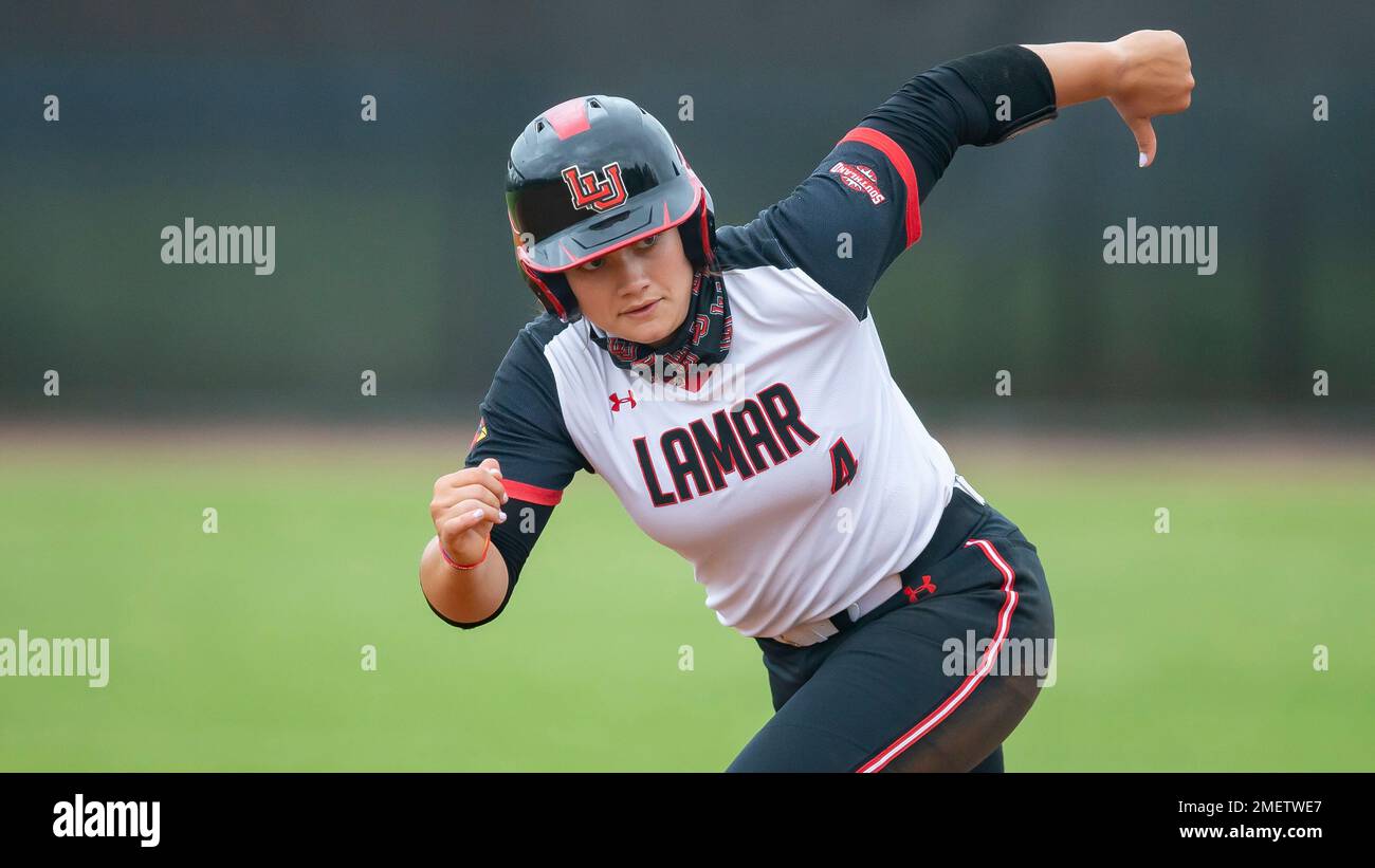 Lamar's Hannah Kinkade leads off of first during an NCAA softball game ...