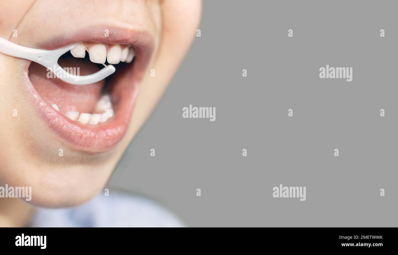 oral health daily hygiene.women or kid using toothpick dental floss or ...