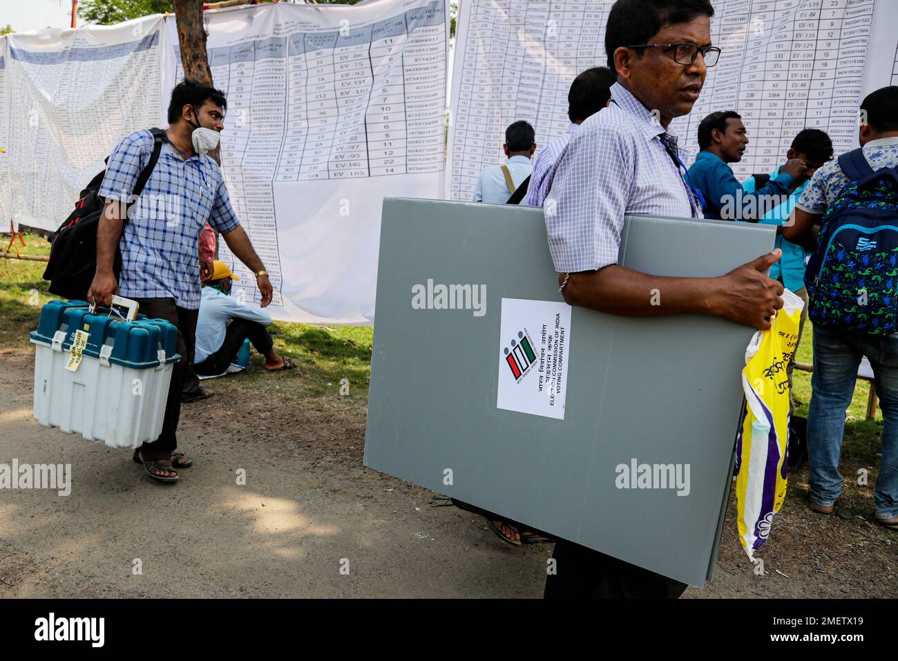 Polling officer carry election material and move towards their assigned ...