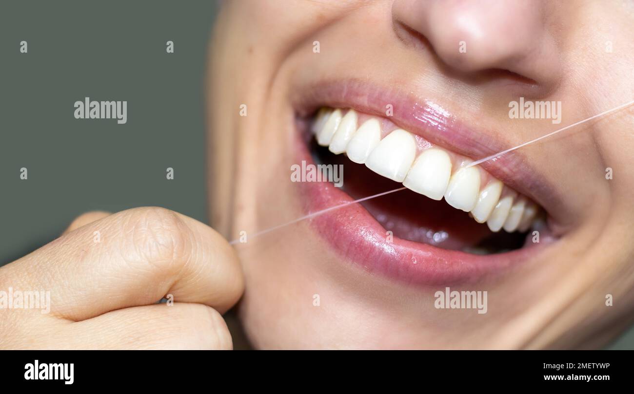 oral health daily hygiene.women or kid using toothpick dental floss or ...