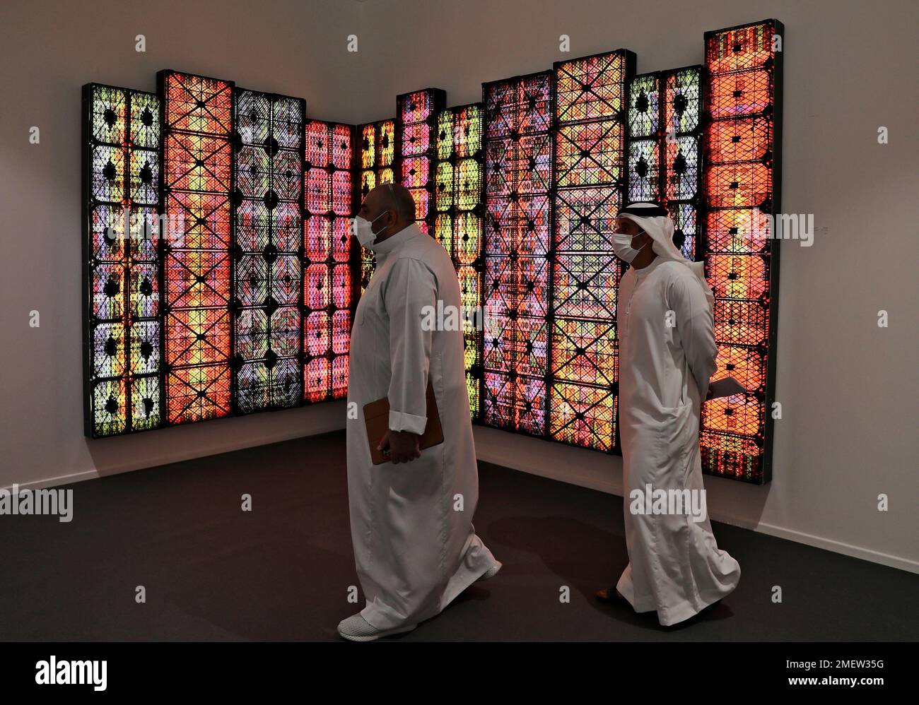 People visit Saudi artist Rashed Al Shashai's work titled Brand 14 ...