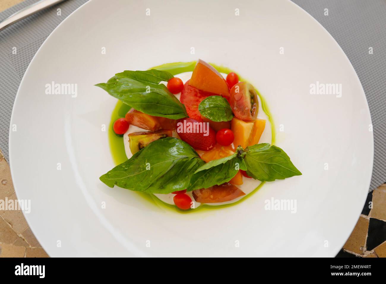 Southern German cuisine, starter, salad of colourful tomatoes with ...