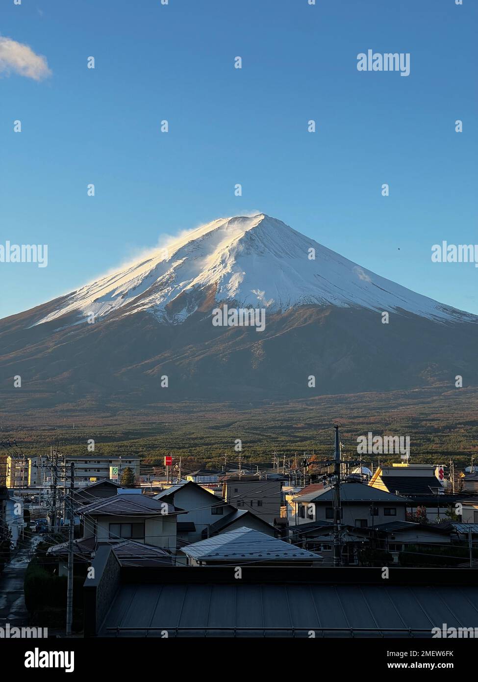 The view of town buildings with Mount Fuji in the background Stock ...