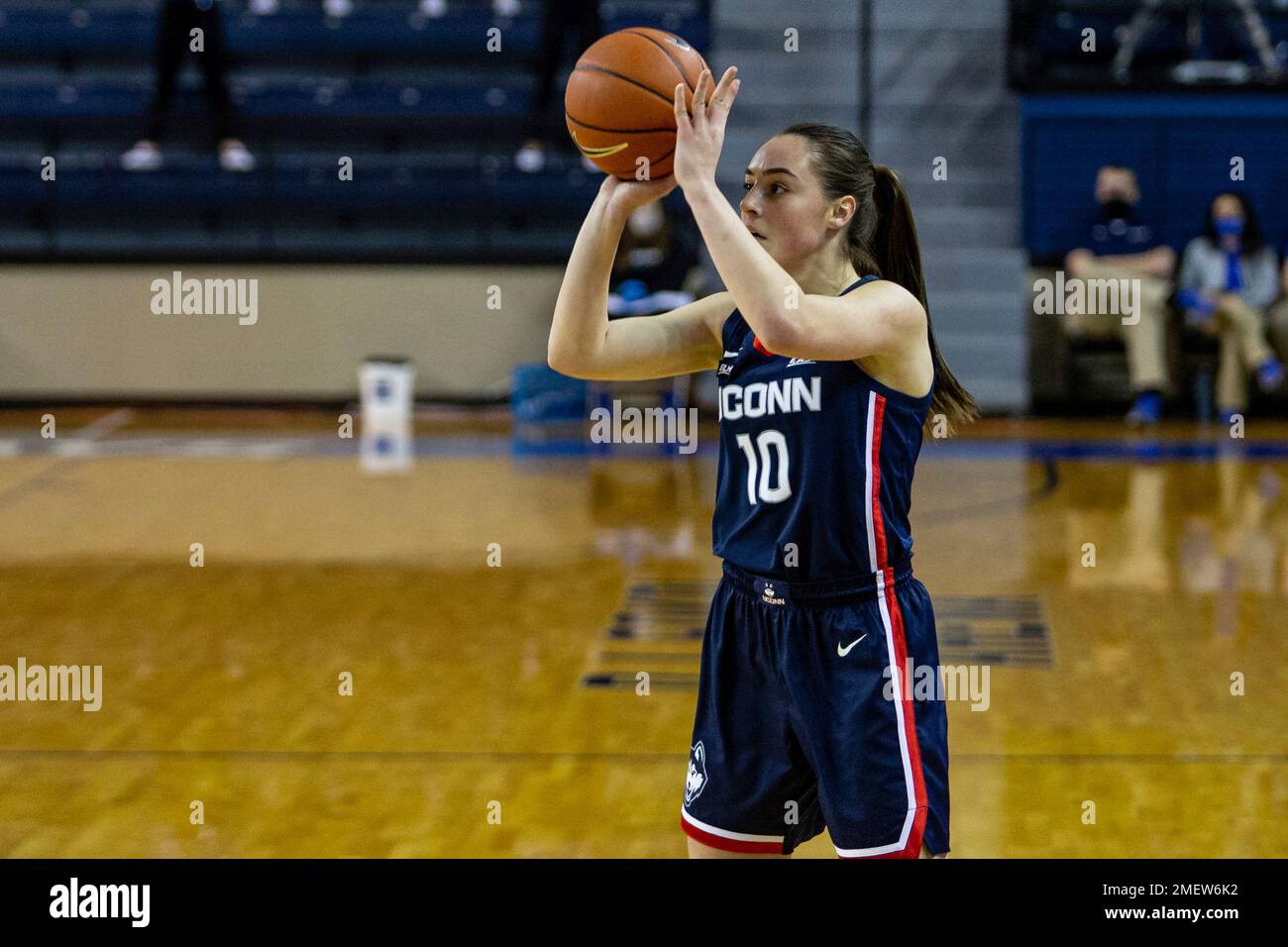 Connecticut guard Nika Muhl (10) shoots a three point shot against ...