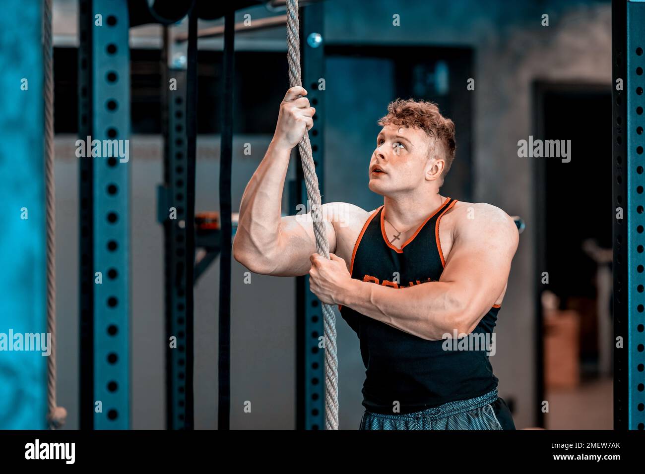 athlete with rope in gym Stock Photo - Alamy