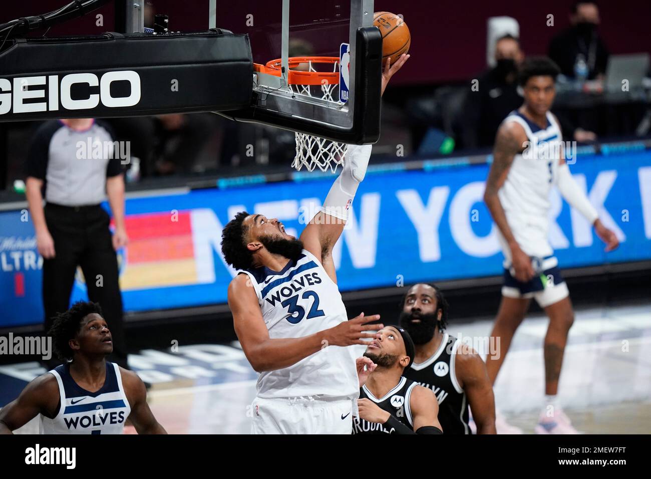 Minnesota Timberwolves Karl-Anthony Towns (32) drives past Brooklyn ...