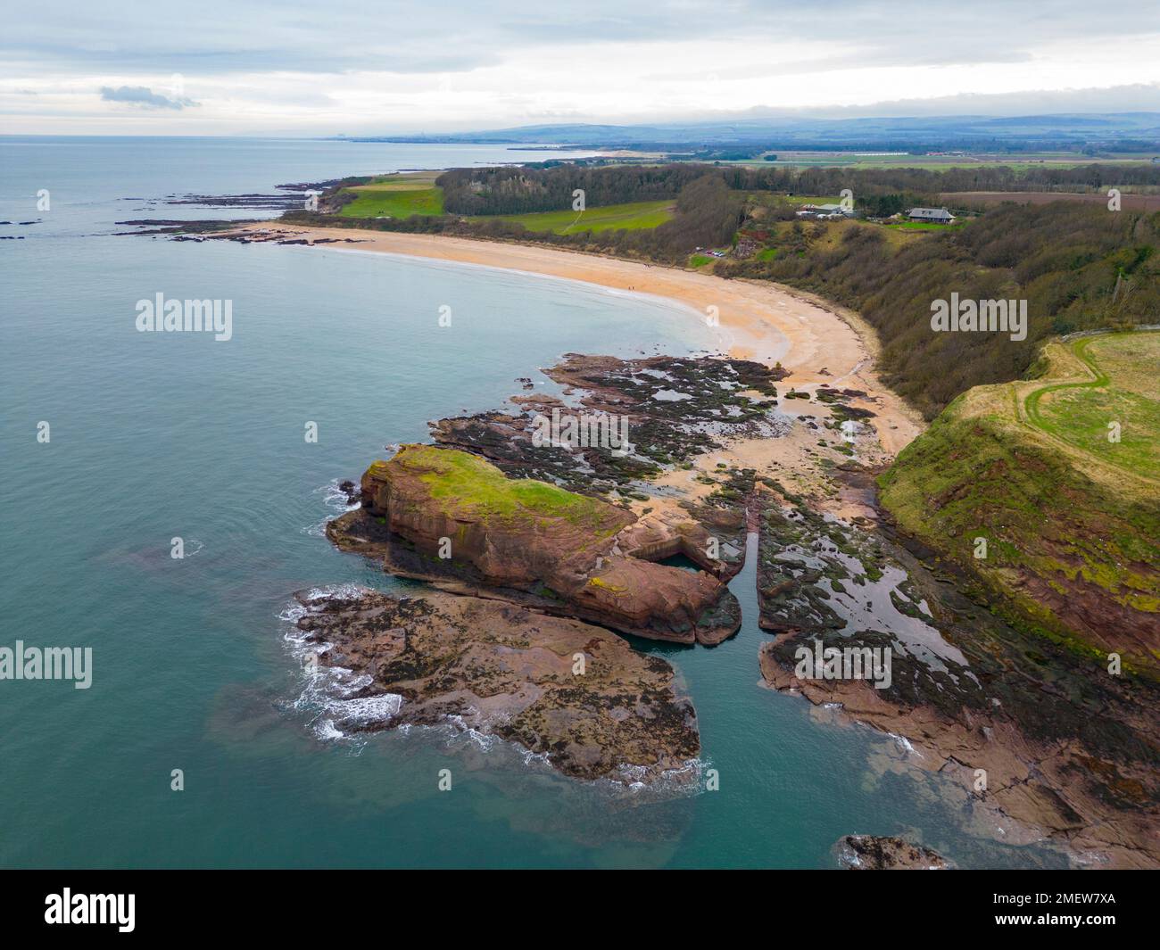 Aerial view looking down on Seacliff harbour and beach near North ...