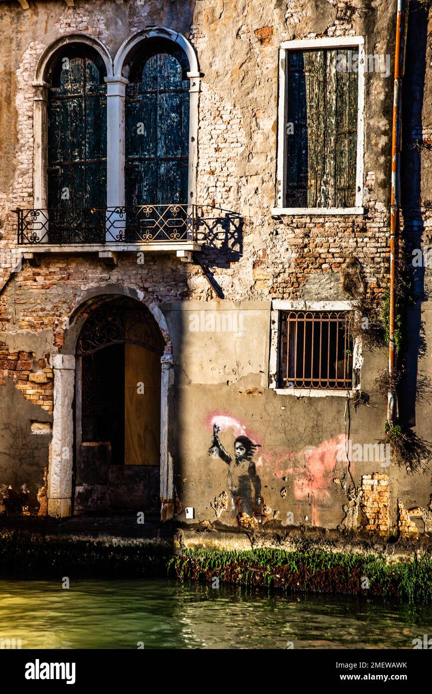 Venice Migrant Child, Venice, 2020, Banksy, street artist, Italy Stock ...