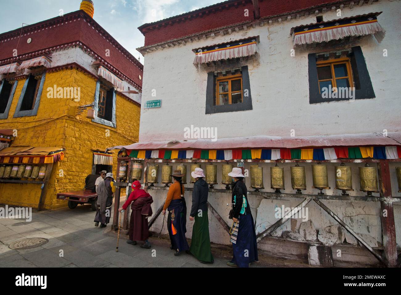Tibetan pilgrims, Buddhists in Tibetan traditional costume circling a ...
