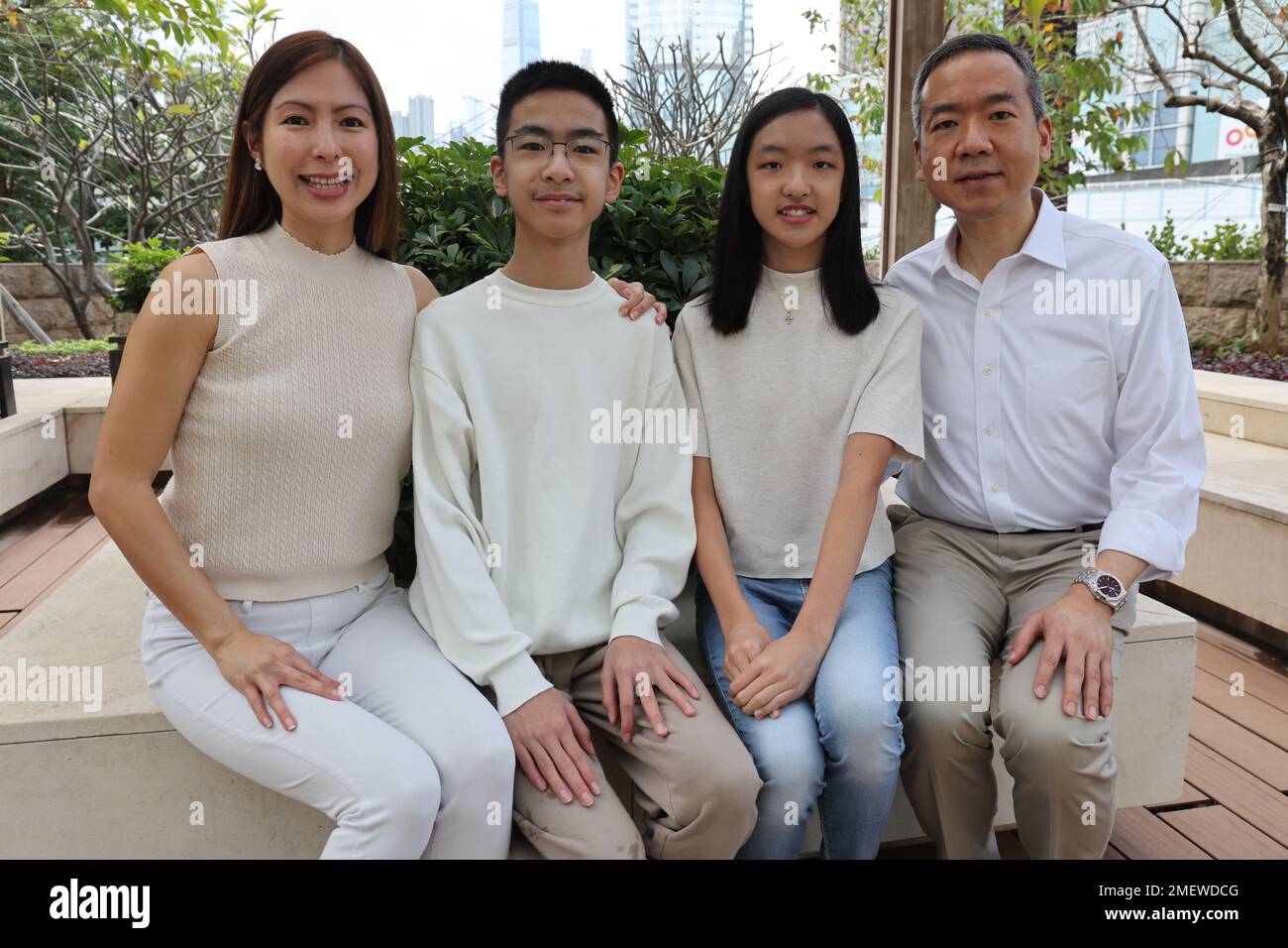 (L to R) Wife May Ang; son Caleb Herrera; daughter Carissa Herrera and ...