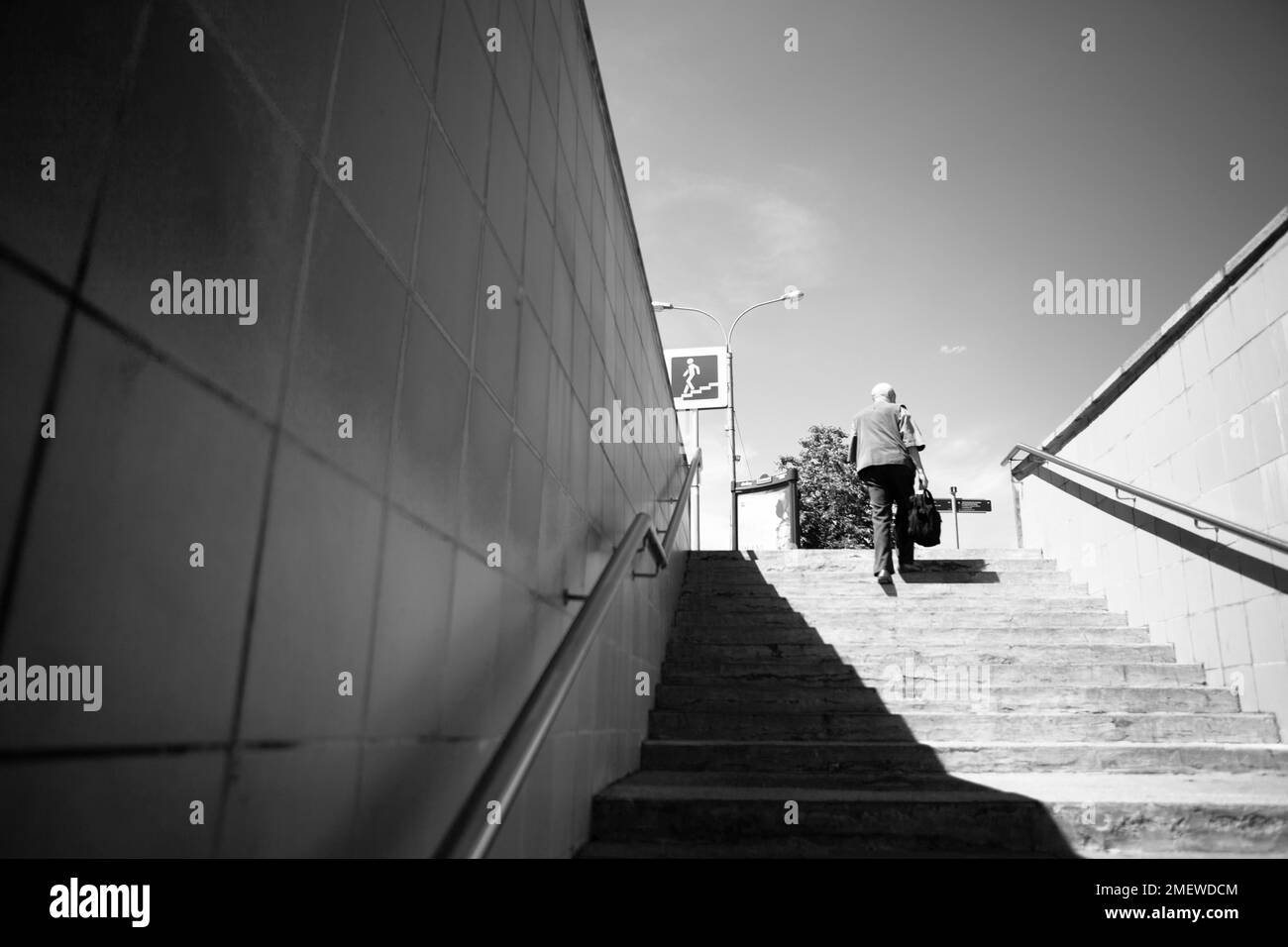 Person in entrance Black and White Stock Photos & Images - Alamy