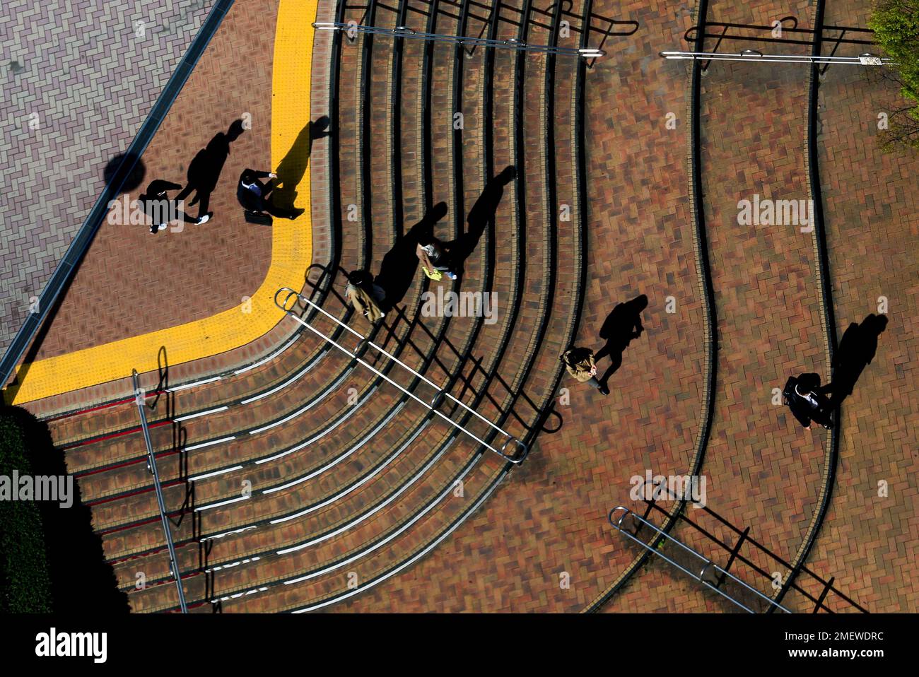 Commuters wearing protective masks to help curb the spread of the ...