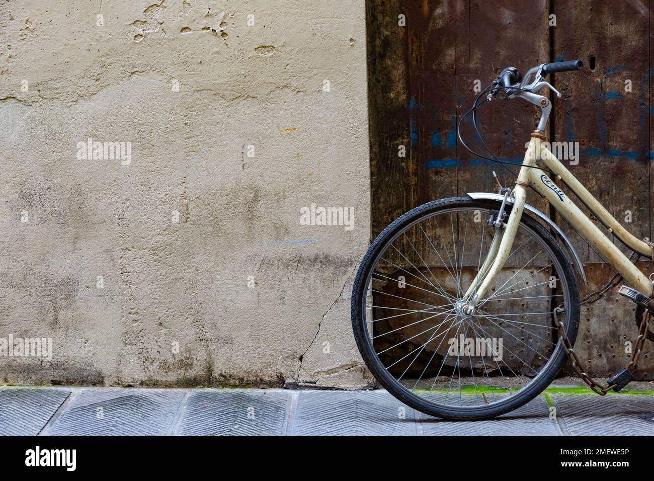Front half of vintage Conti bicycle leaning up against rustic wooden ...