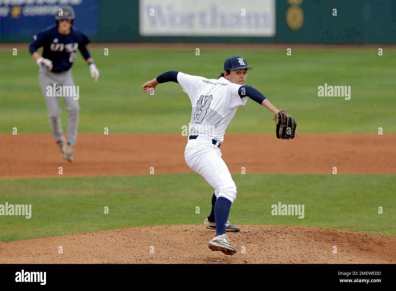 Rice starting pitcher Brandon Deskins, right, throws as Texas at San ...