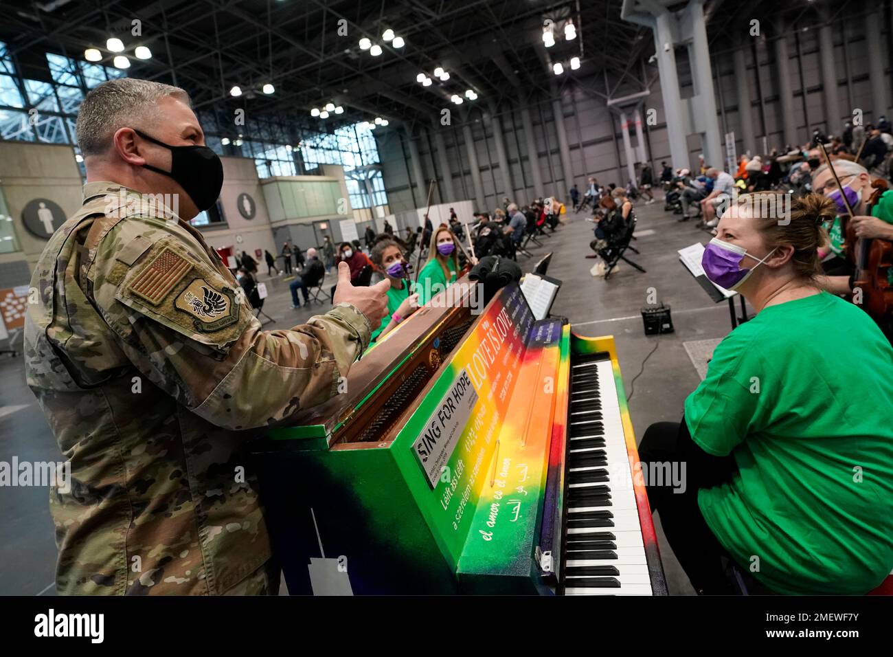 Air Force Major Michael O'Hagan, left, speaks to pianist Barbara ...