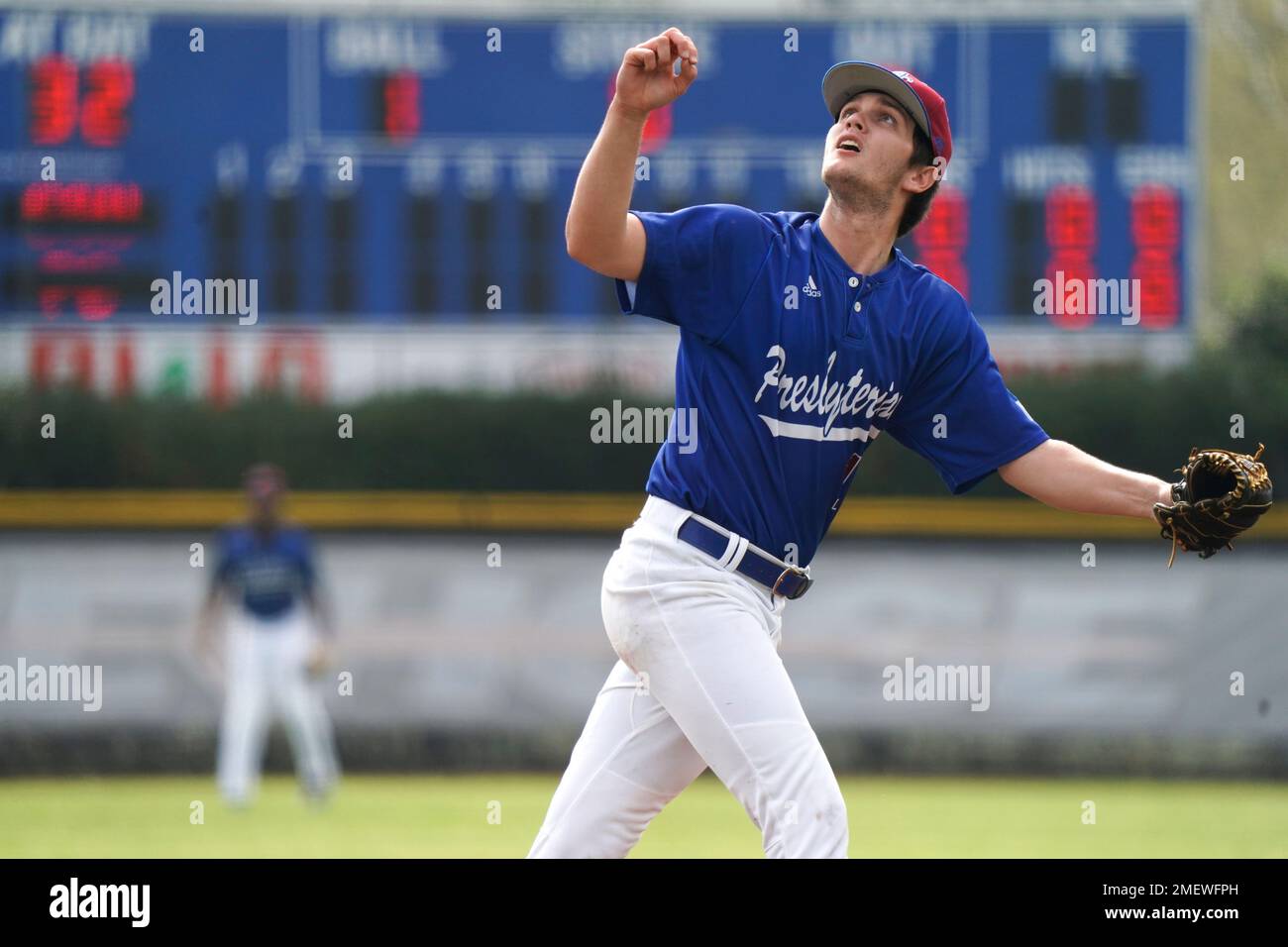 Presbyterian pitcher Eric Miles watches a fly ball during an NCAA ...