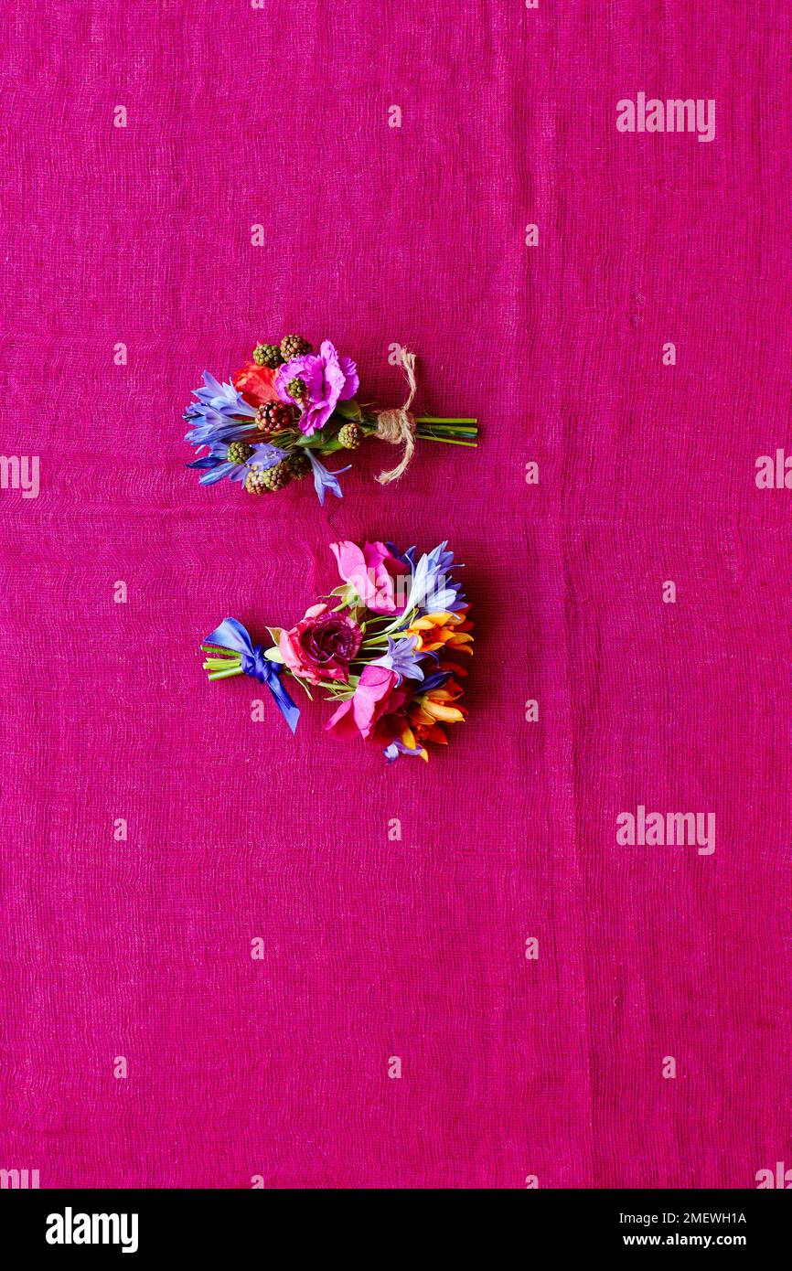Bohemian wedding buttonholes Stock Photo - Alamy