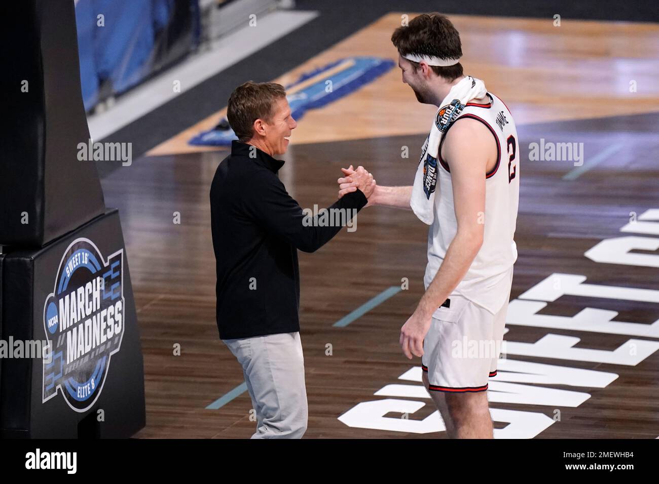 Gonzaga head coach Mark Few congratulates Drew Timme after beating ...