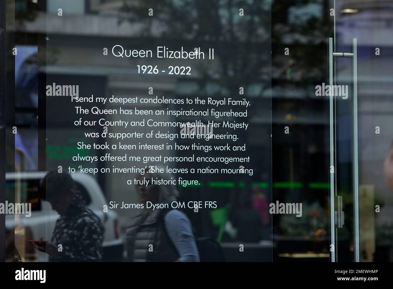 A message for Queen Elizabeth II and the royal family is displayed in a ...