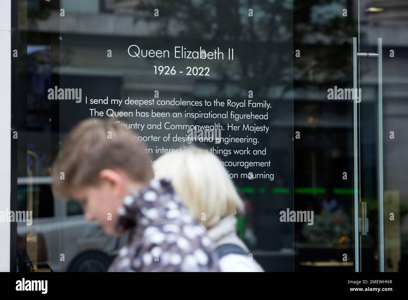 A message for Queen Elizabeth II and the royal family is displayed in a ...