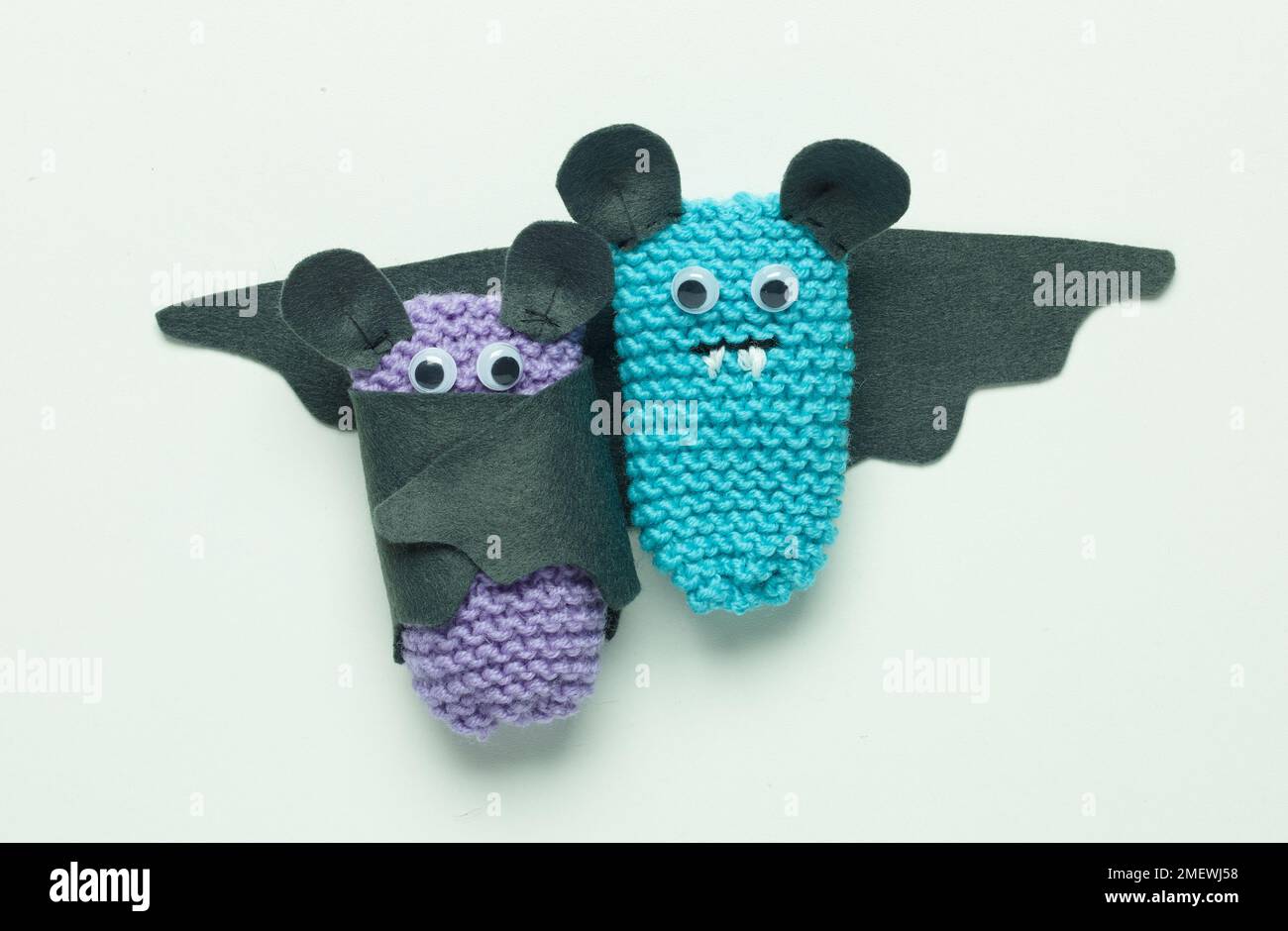 Purple and blue knitted bat Stock Photo - Alamy