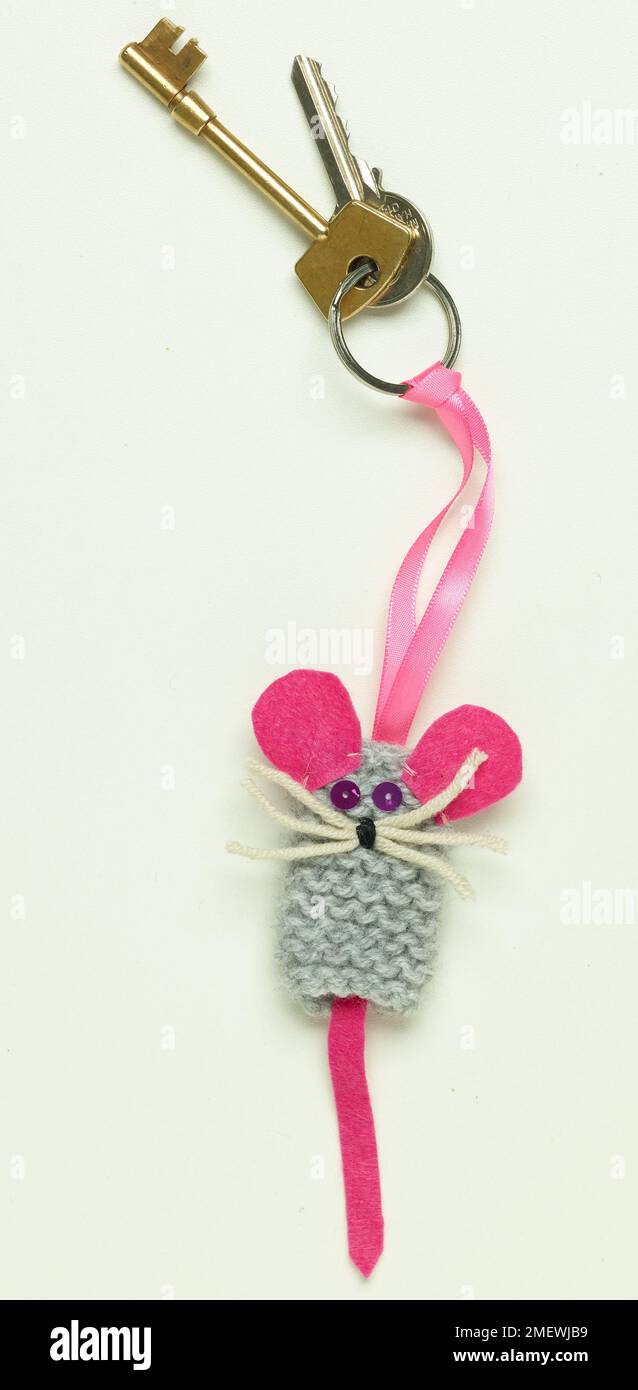 Finger puppets used as key ring charms Stock Photo - Alamy