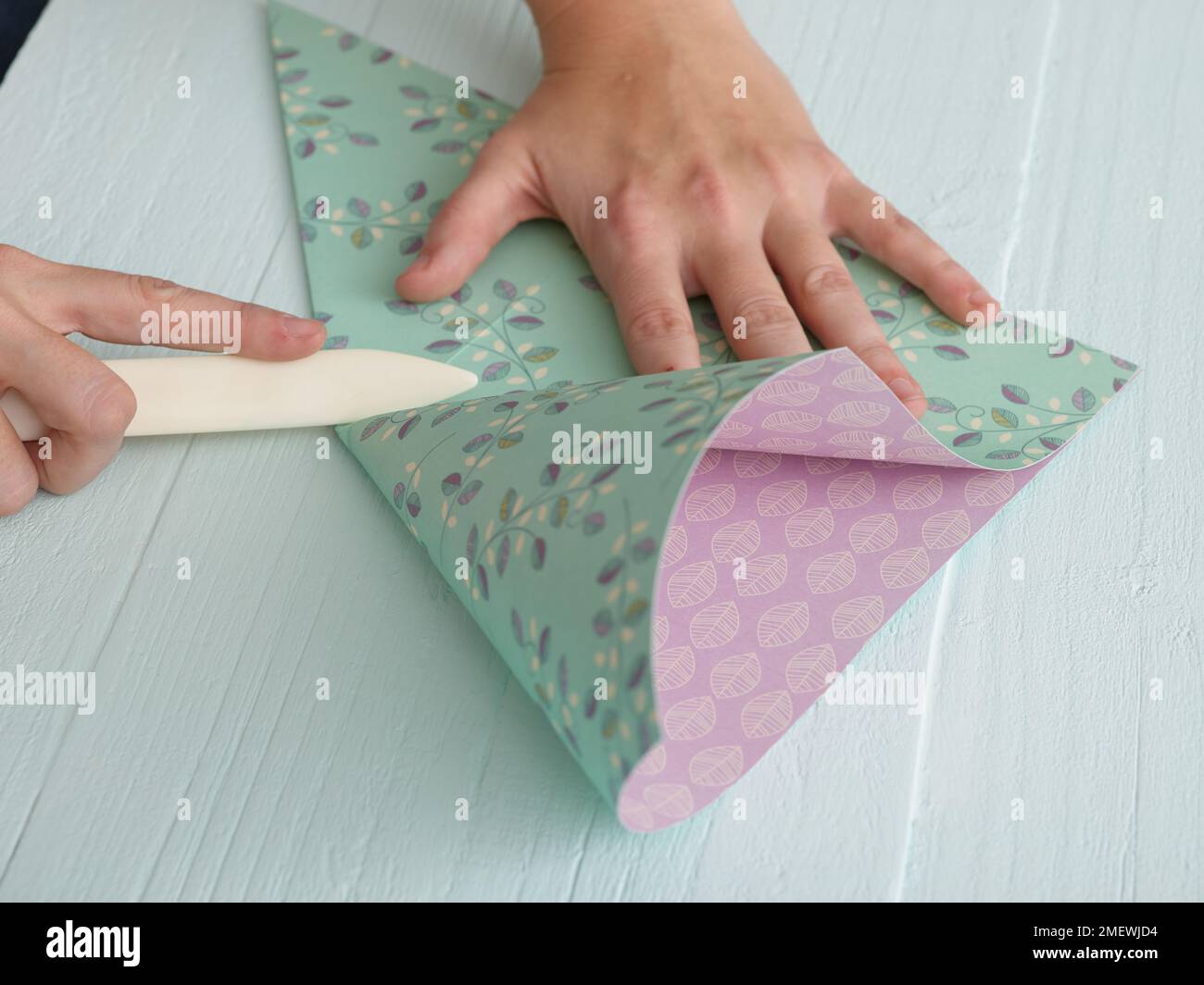 Paper Craft. DIY Origami Gift box Step 2 Stock Photo - Alamy