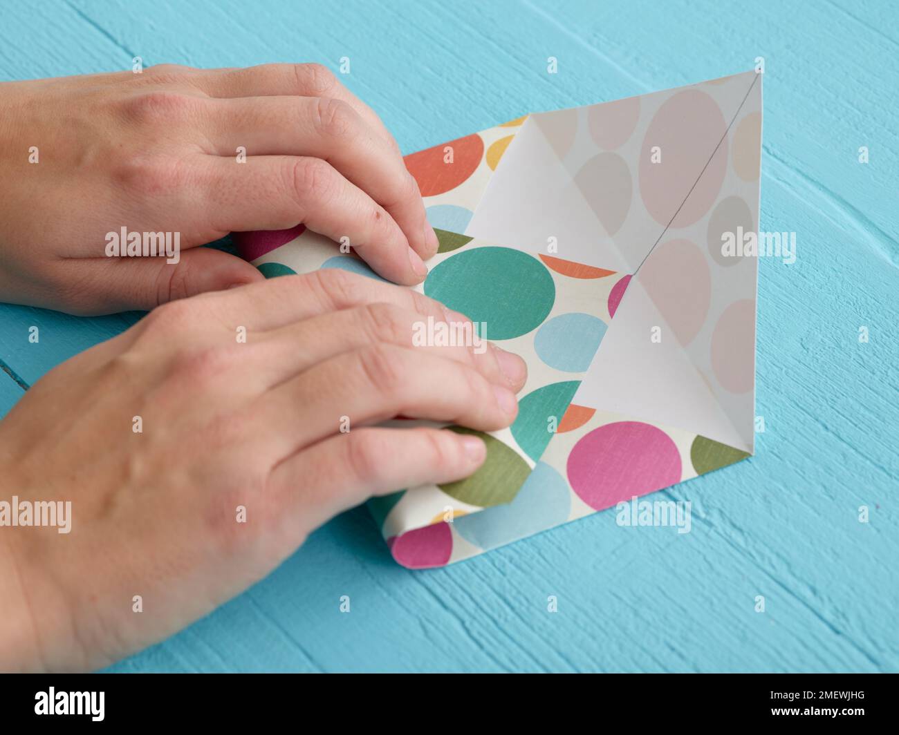 Paper Craft. DIY Envelope Step 4 Stock Photo - Alamy